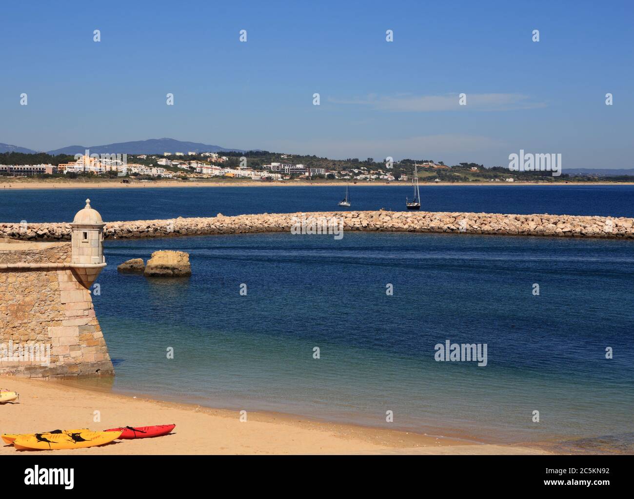 Lagos, Algarve, Portugal. Cliff top view of the estuary, historic fort ...