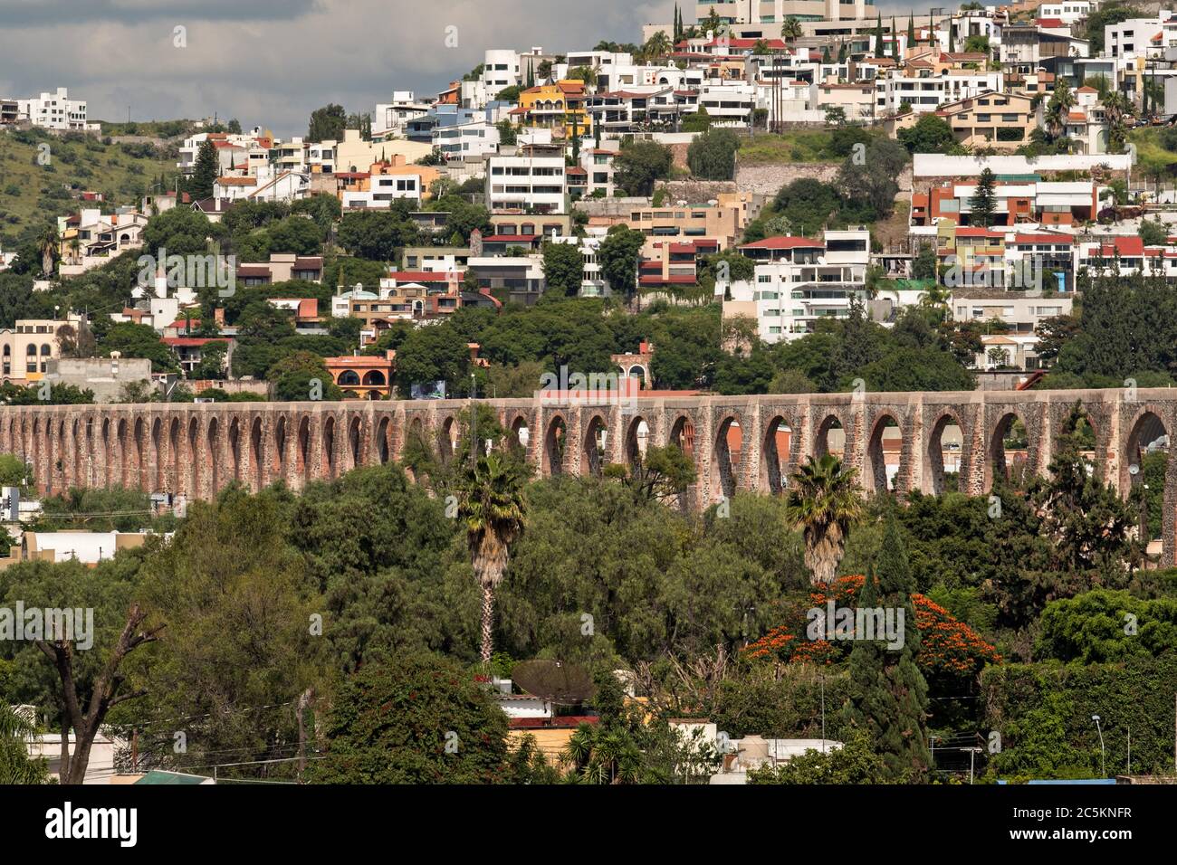 The ancient stone Aqueduct of Queretaro running across the city center ...
