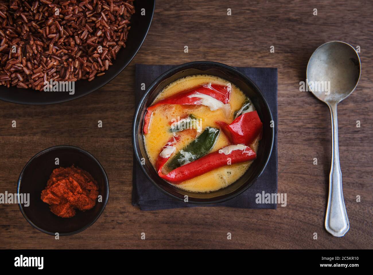 Bhutanese ema datsi with brown rice and eze spice Stock Photo - Alamy