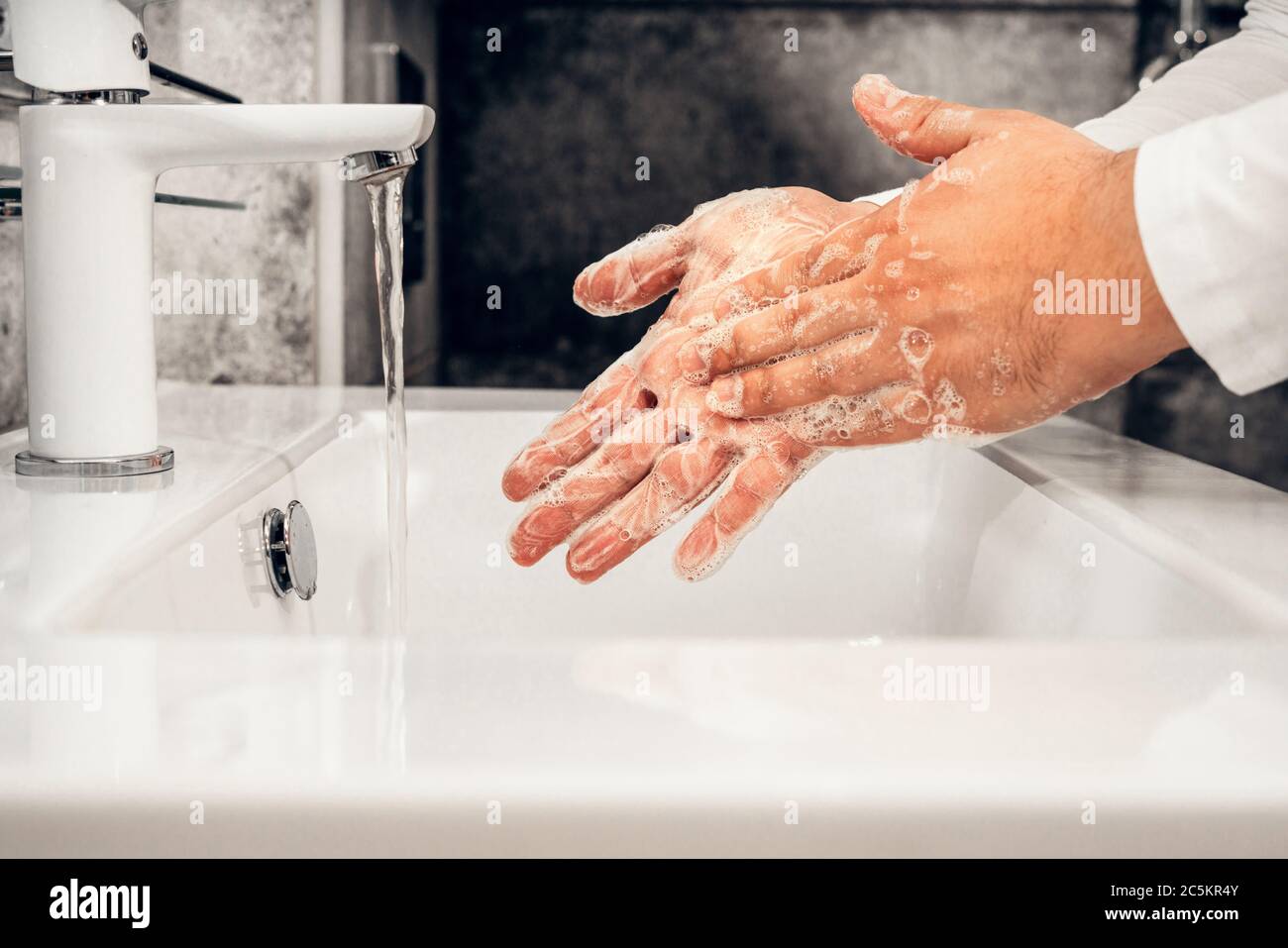Coronavirus. Proper washing and handling of hands. Liquid antibacterial ...