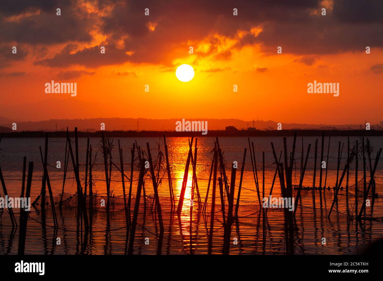 Sunset over Albufera freshwater lagoon and estuary on the Gulf of ...