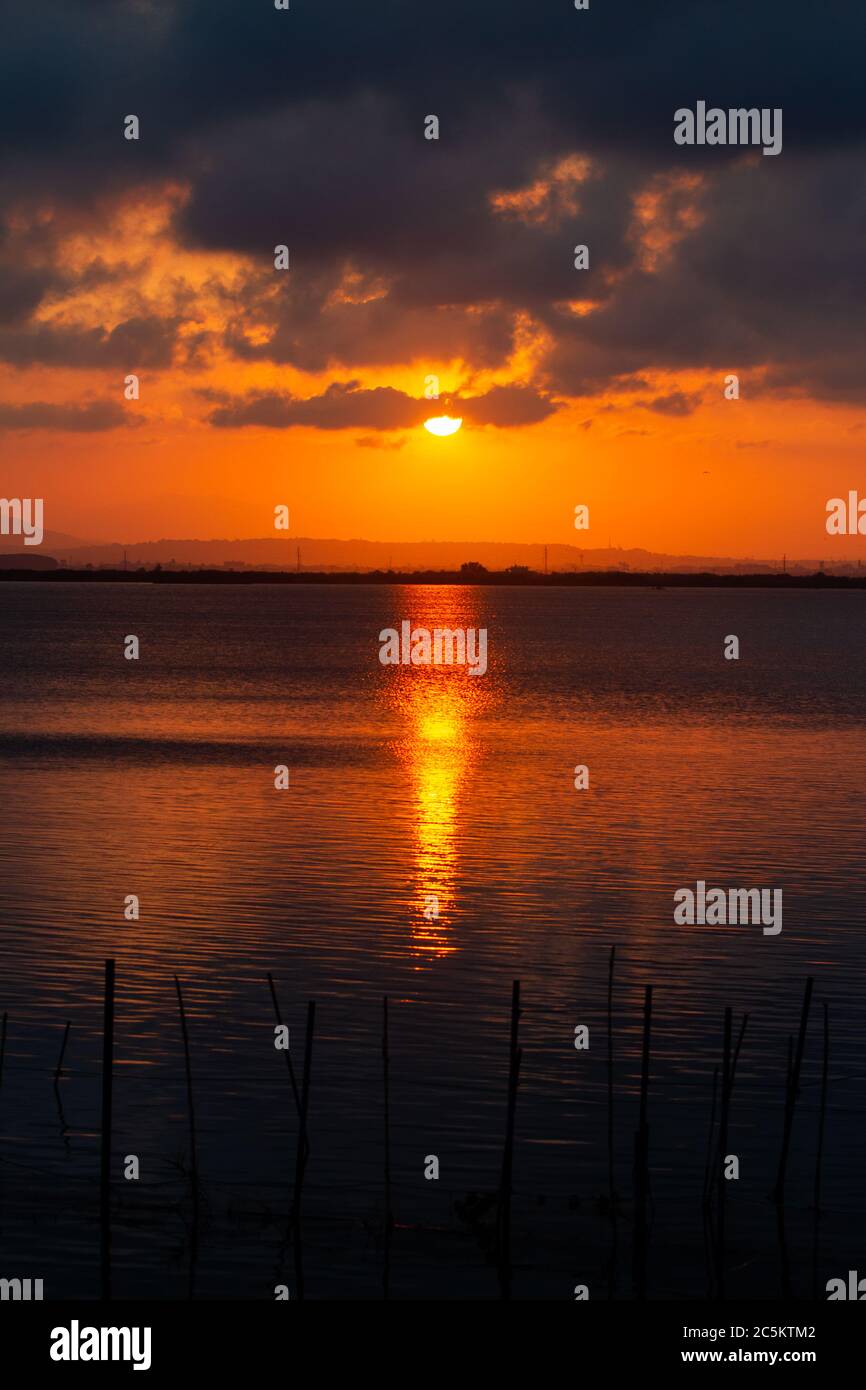 Sunset over Albufera freshwater lagoon and estuary on the Gulf of ...