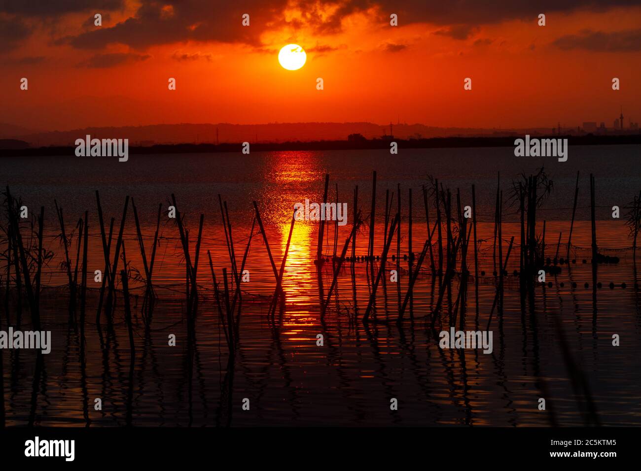 Sunset over Albufera freshwater lagoon and estuary on the Gulf of ...