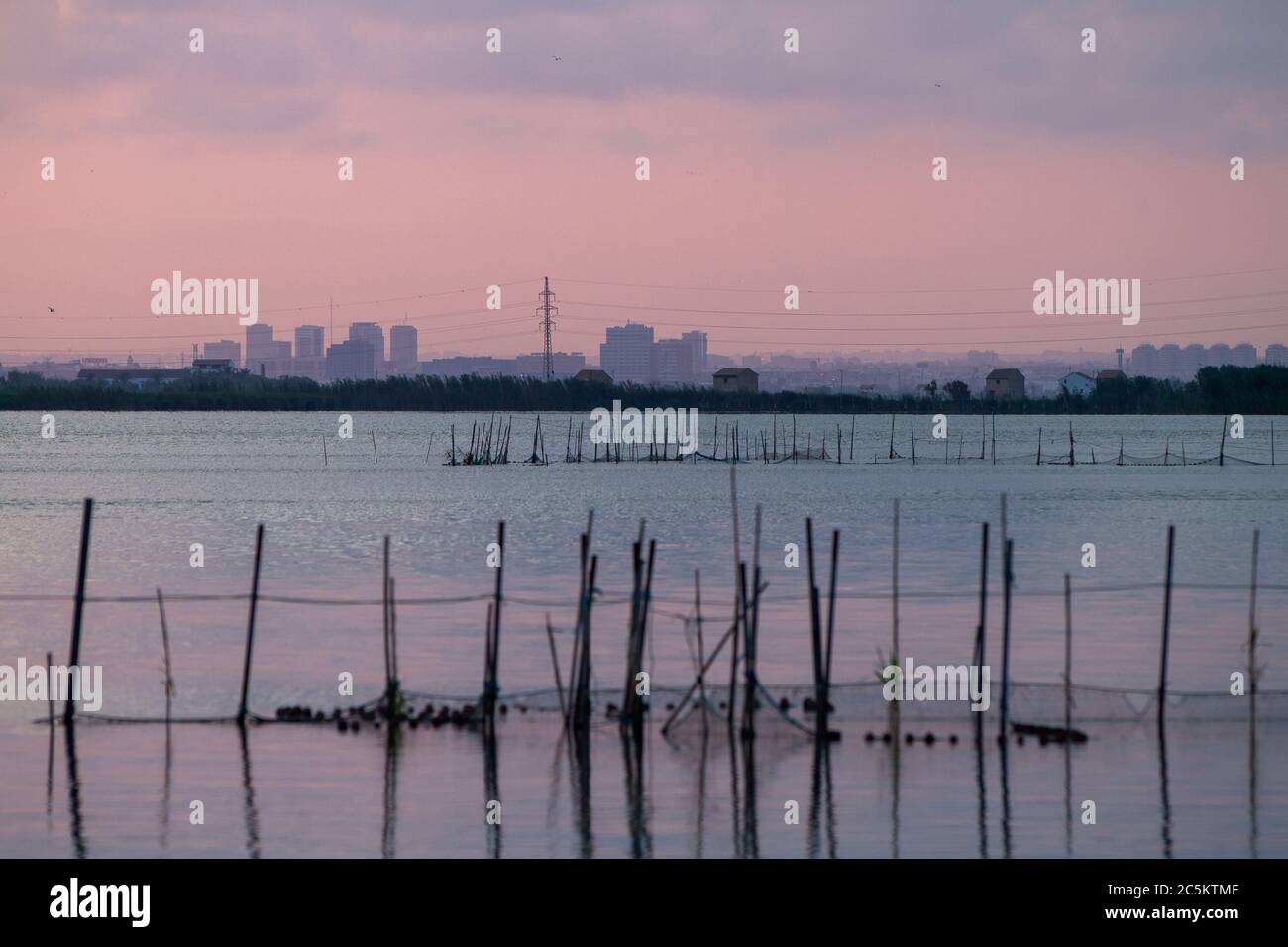 Sunset over Albufera freshwater lagoon and estuary on the Gulf of ...