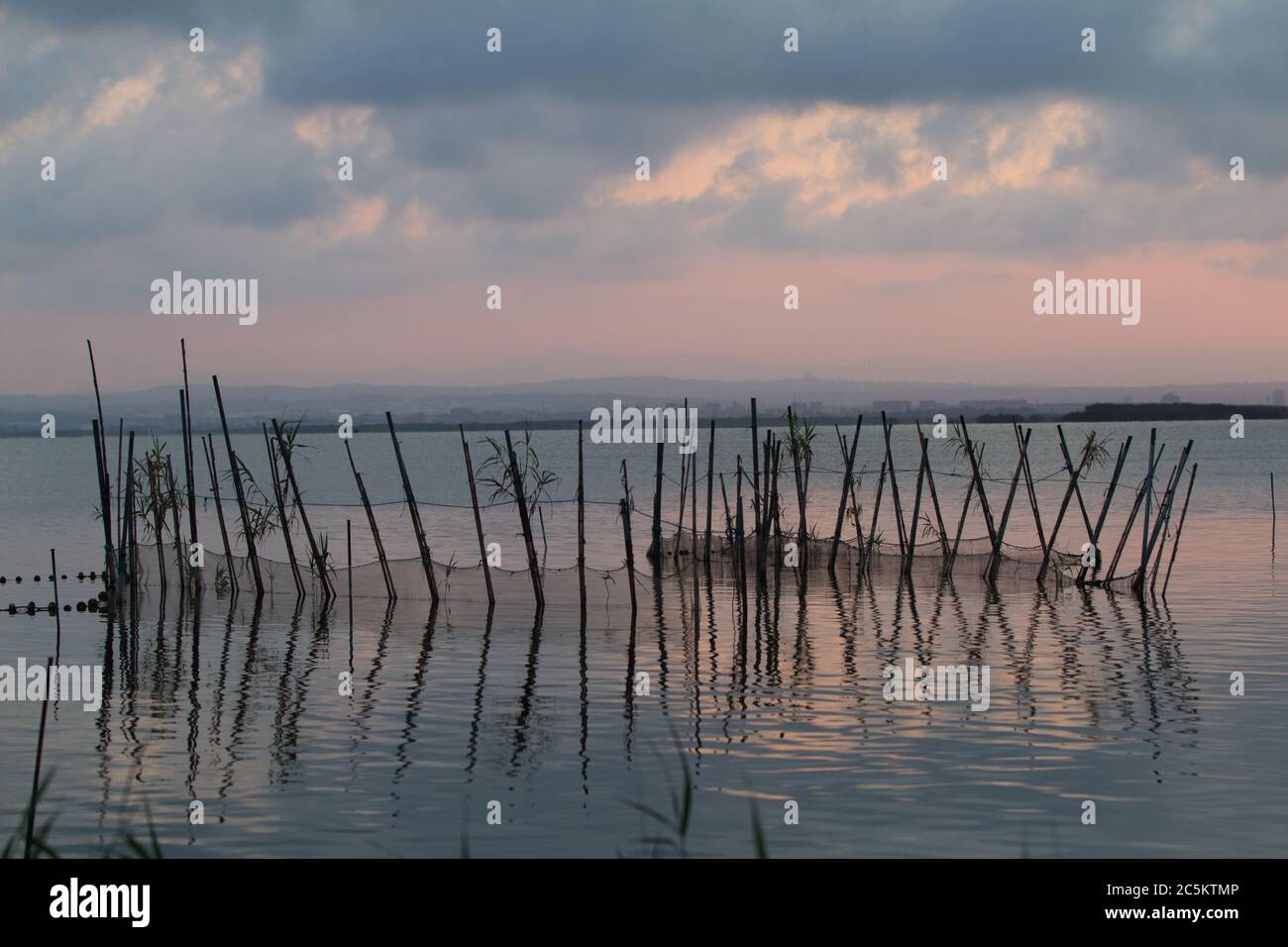 Sunset over Albufera freshwater lagoon and estuary on the Gulf of ...