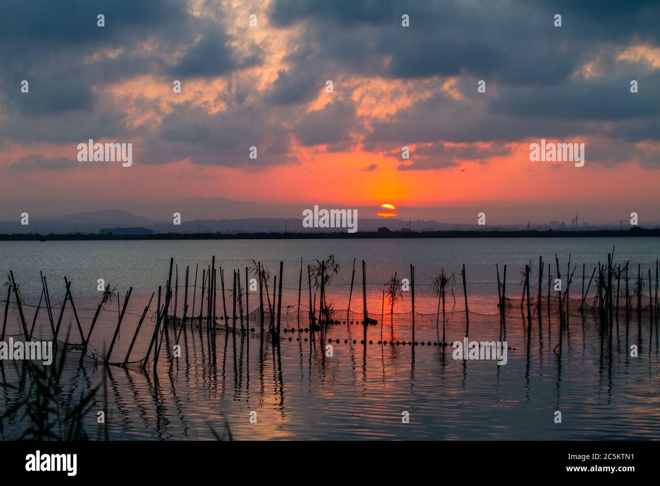 Sunset over Albufera freshwater lagoon and estuary on the Gulf of ...