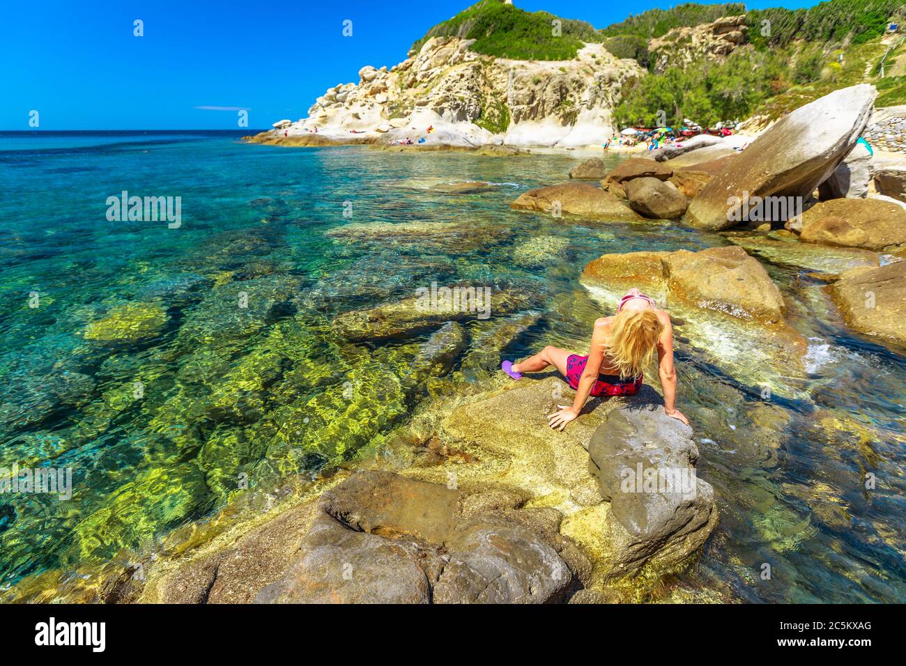 Italian woman sunbathing on beach hi-res stock photography and images ...