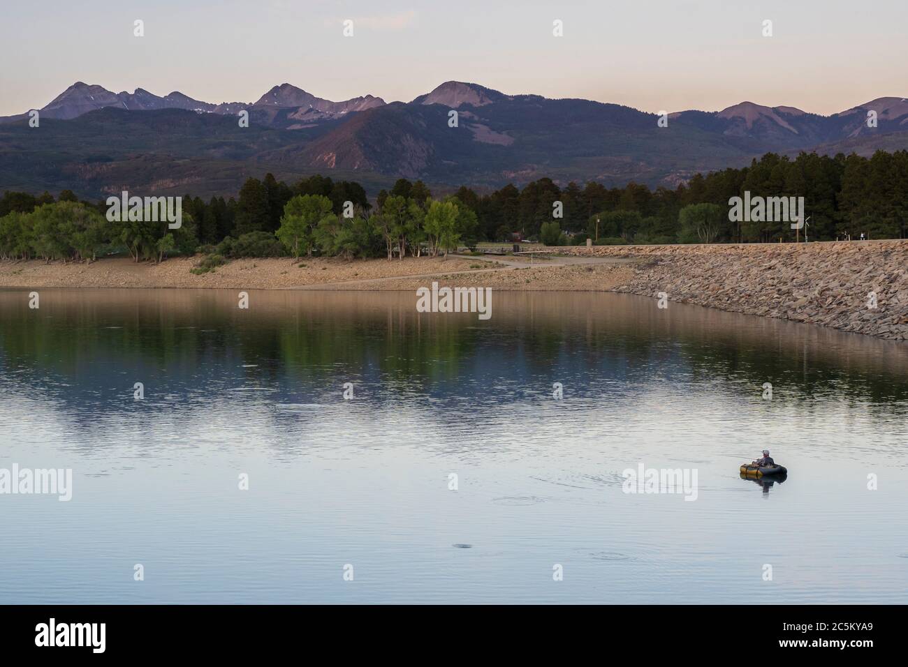Fisherman in the water, Jackson Gulch Reservoir, Mancos State Park ...