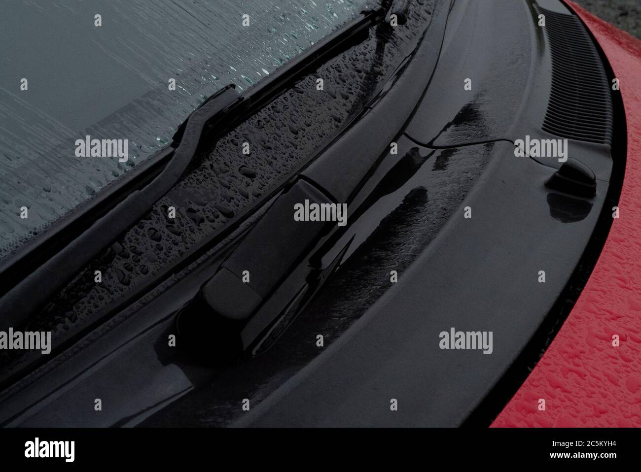 Red Car Wet Windscreen Stock Photo - Alamy