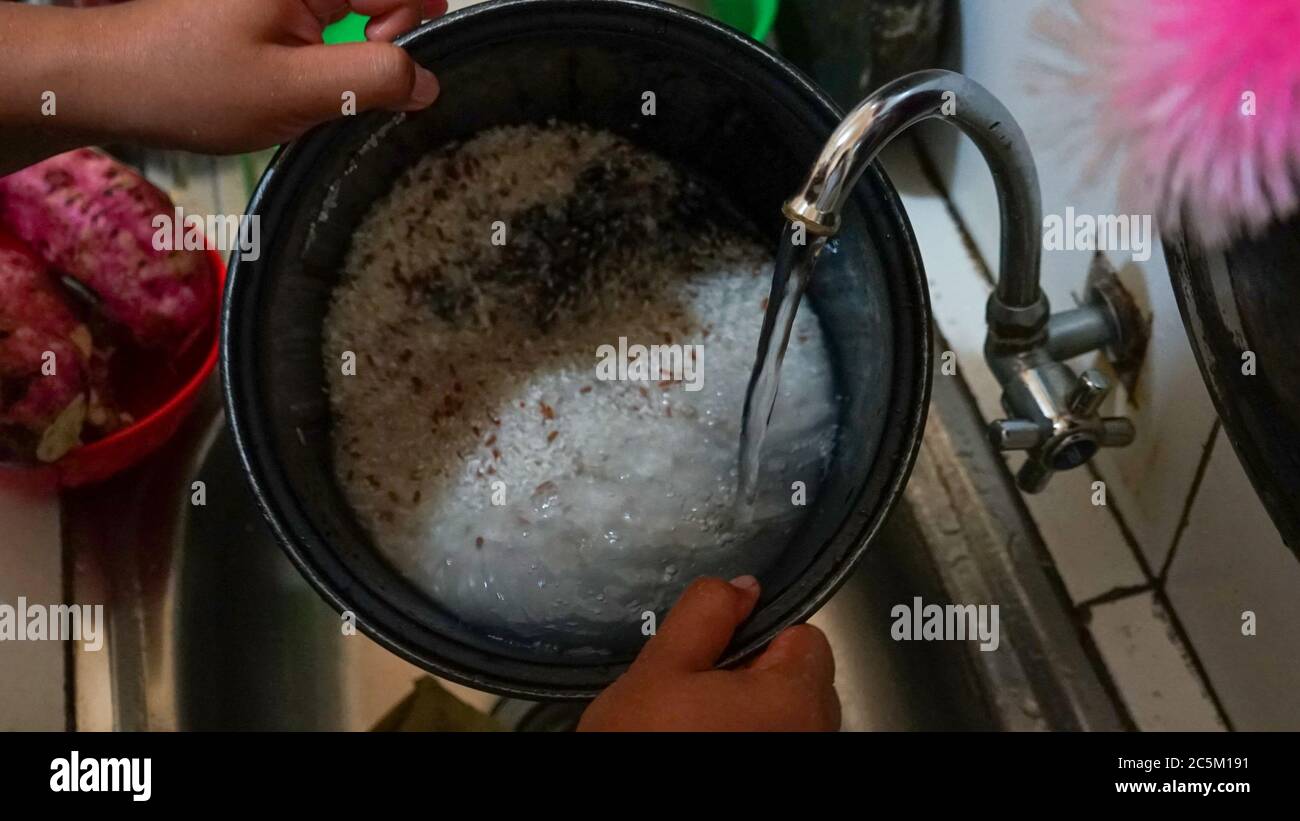 Cleaning rice hi-res stock photography and images - Alamy