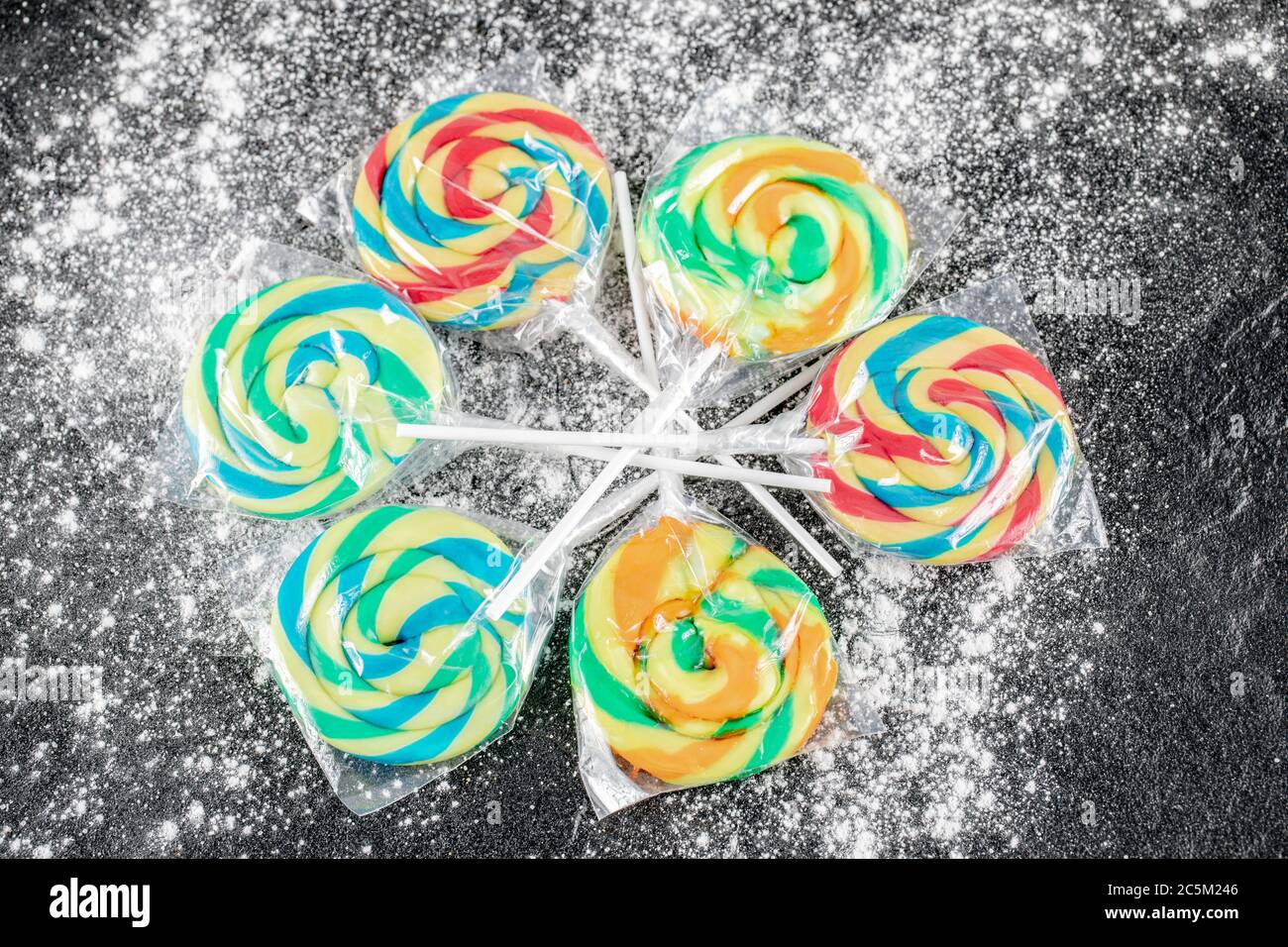 Colorful rainbow candy sticks Stock Photo - Alamy
