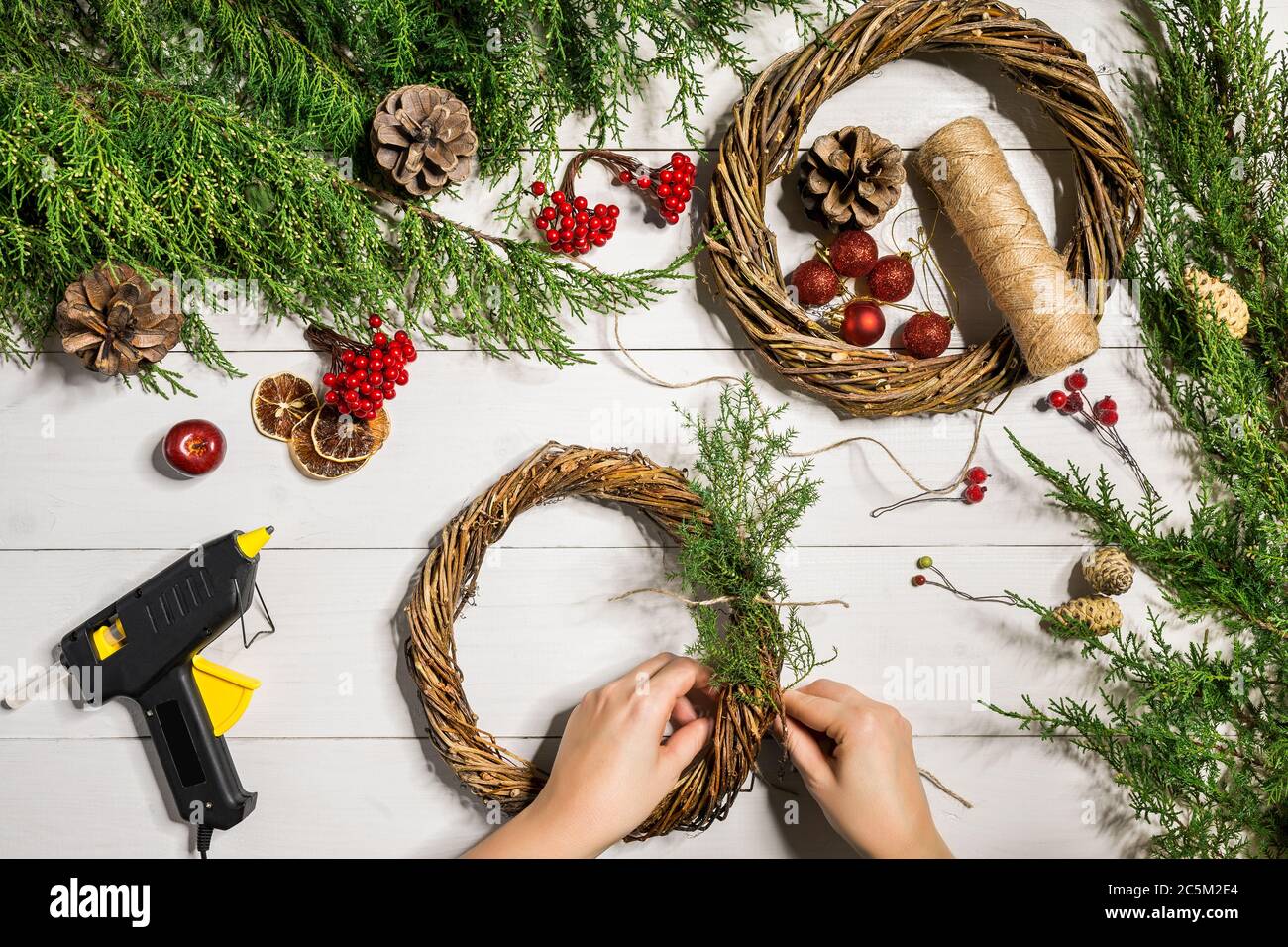 Christmas handmade diy background. Making craft xmas wreath and ...