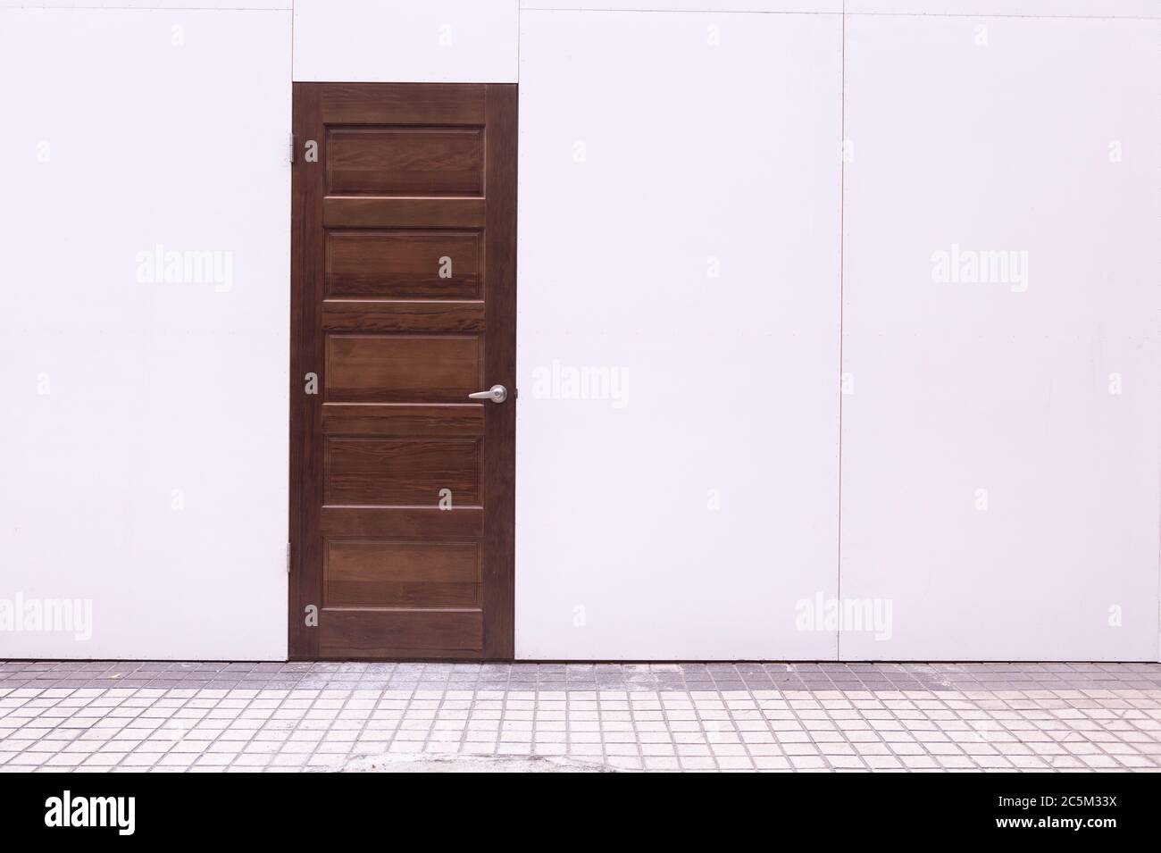 sidewalk by street wall & door Stock Photo - Alamy