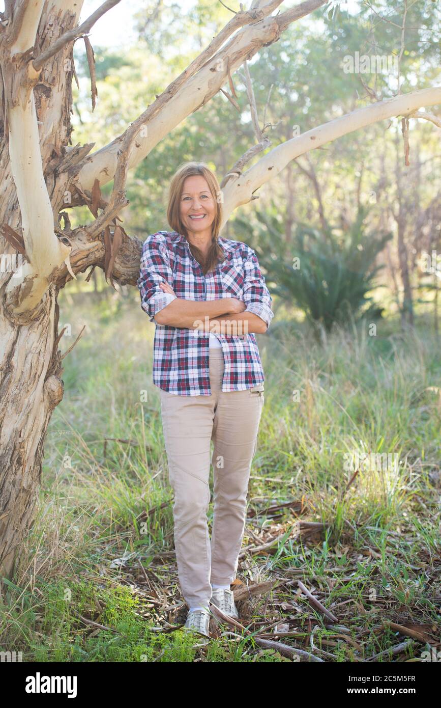 Mature woman in woods hi-res stock photography and images - Alamy