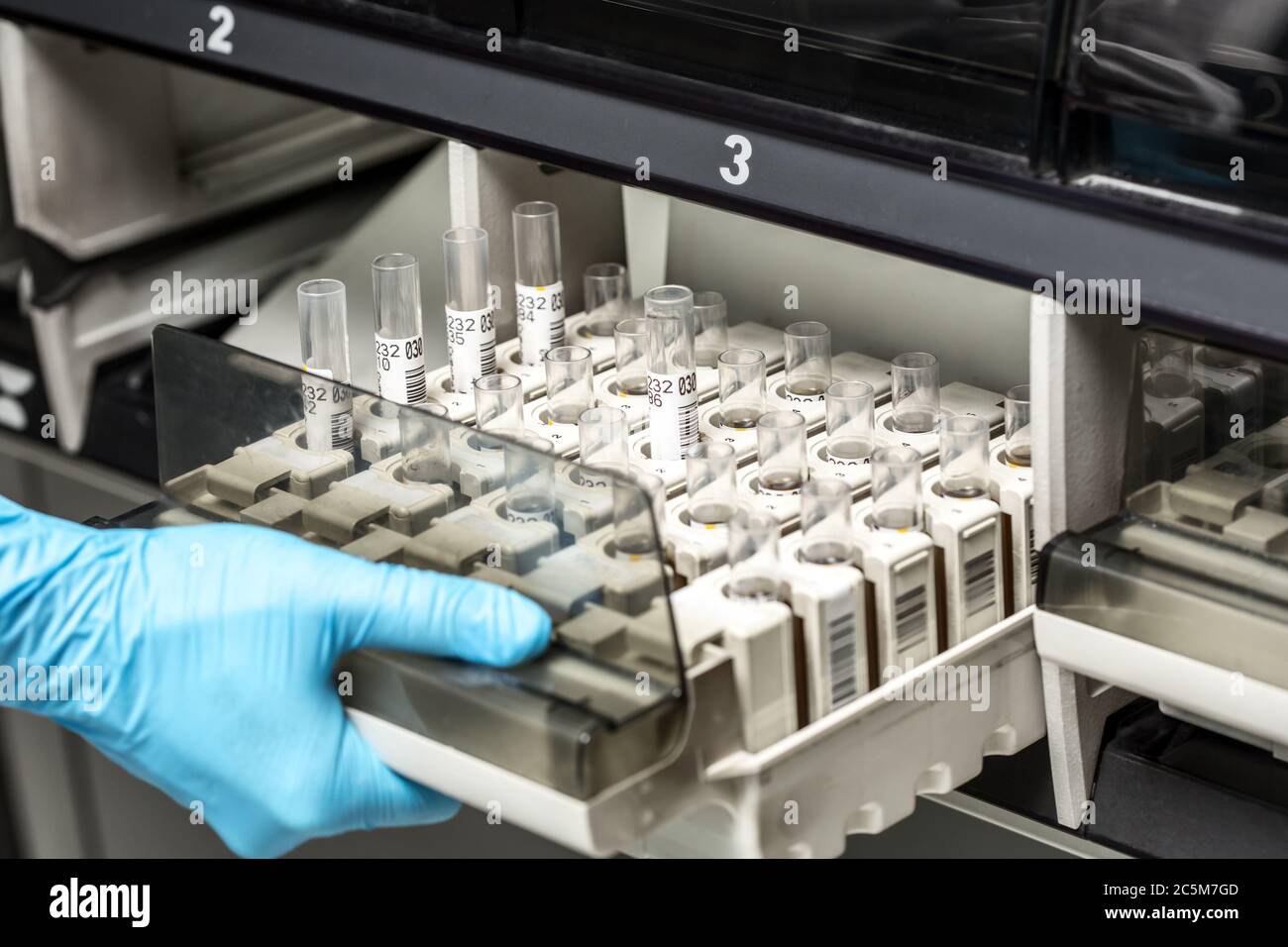 A chemical sample bottle. Centrifuge. A test tube vial sets for ...