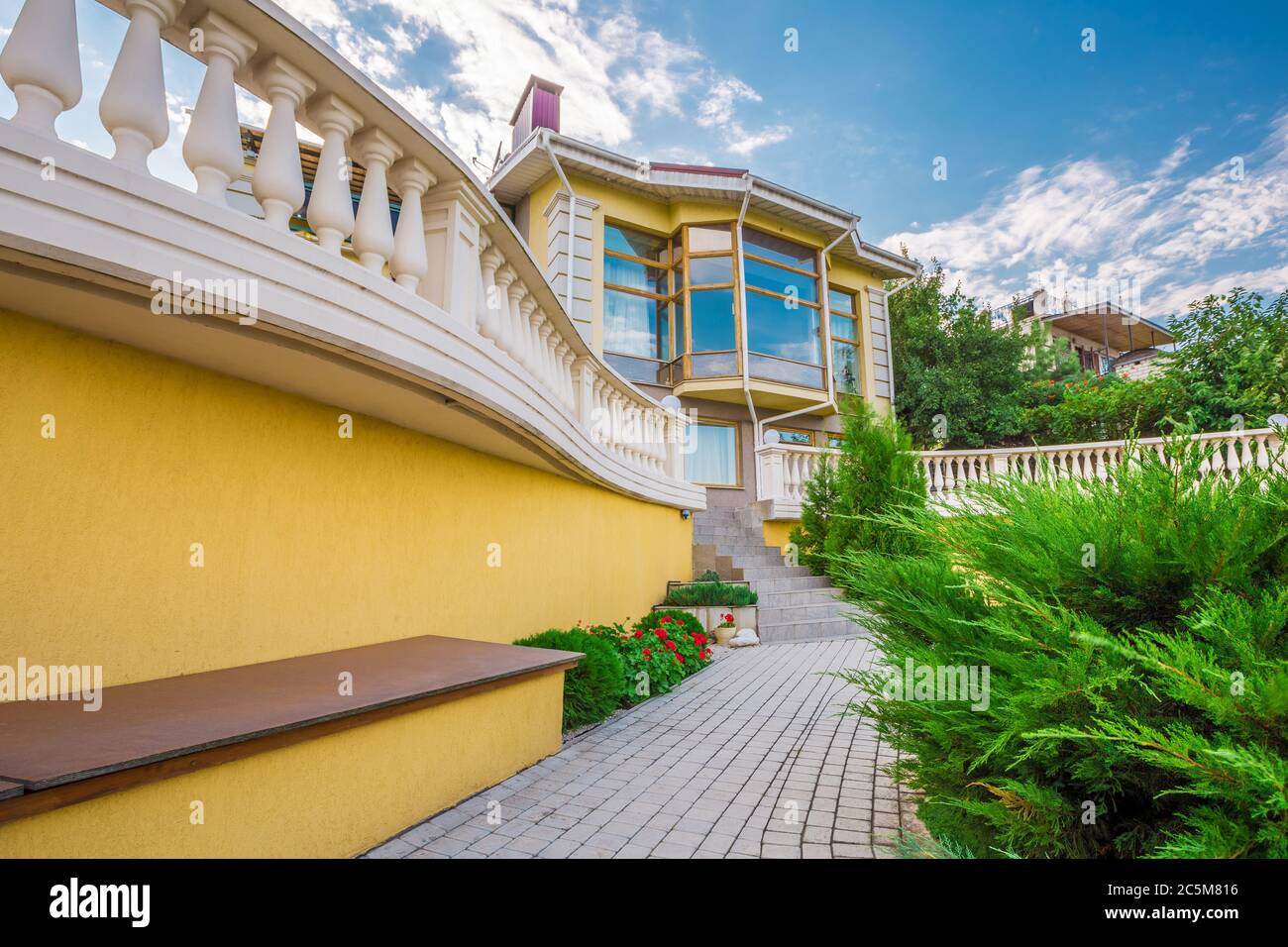 Beautiful house with a lawn Stock Photo - Alamy