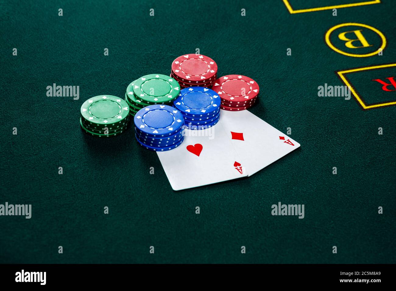 Poker play. Chips and cards Stock Photo - Alamy