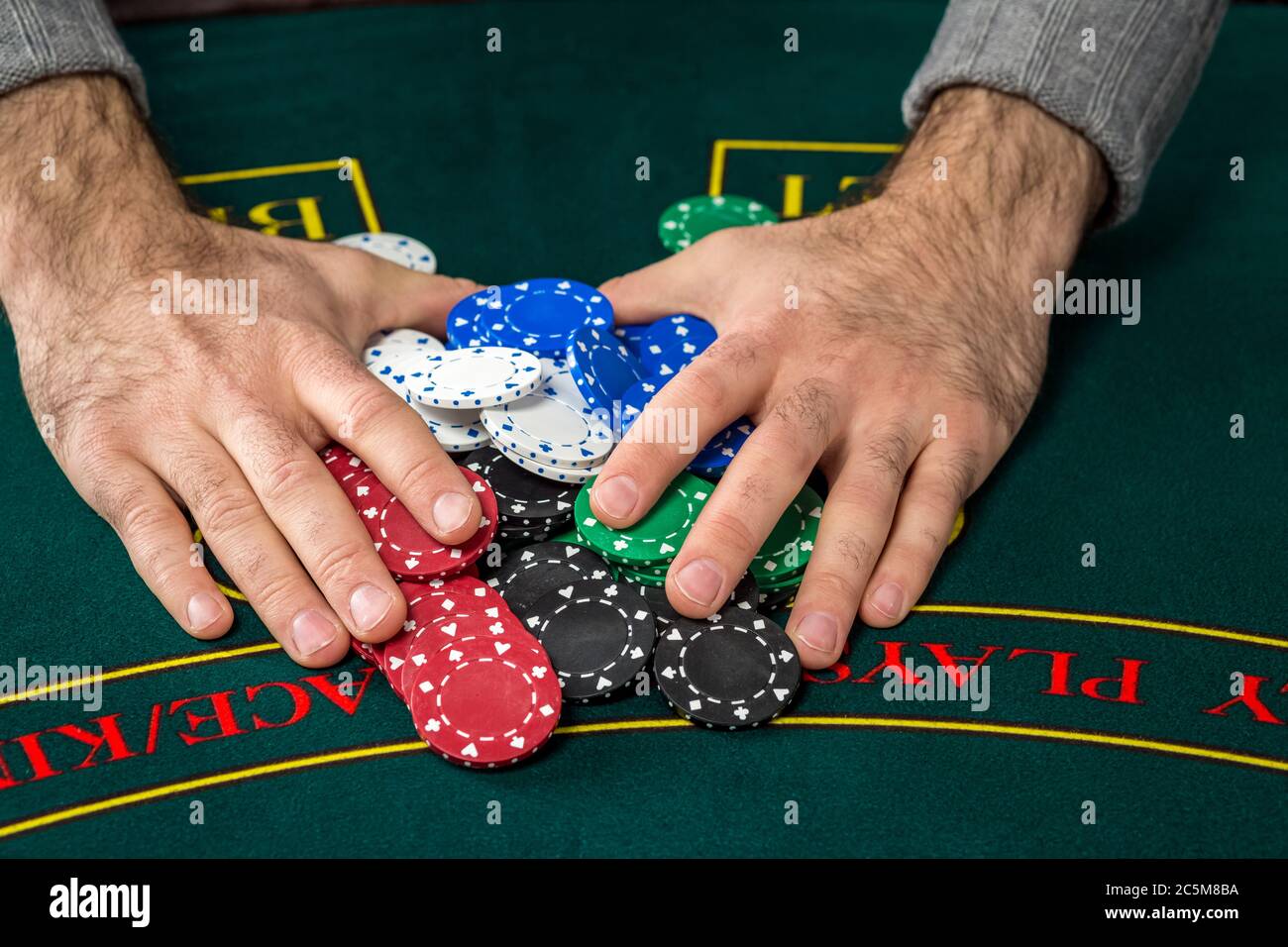 Poker play. Chips and cards Stock Photo - Alamy