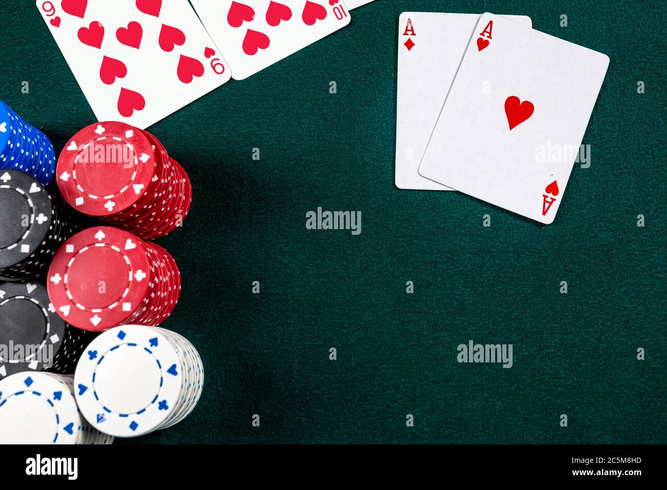 Poker play. Chips and cards Stock Photo - Alamy
