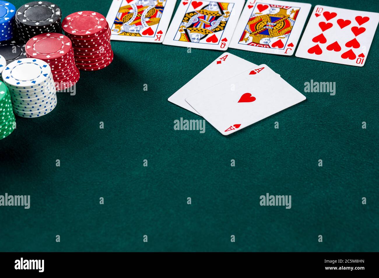 Poker play. Chips and cards Stock Photo - Alamy