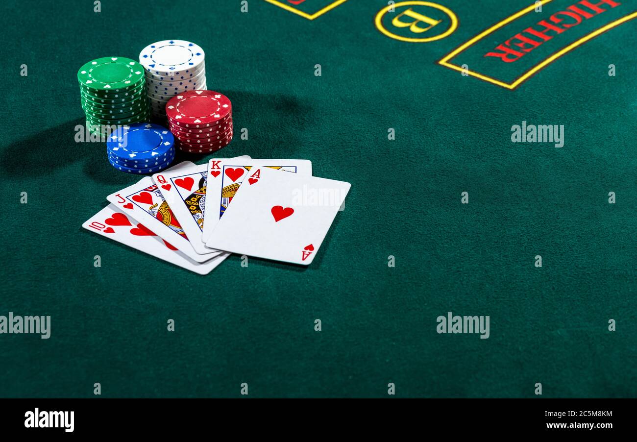 Poker play. Chips and cards Stock Photo - Alamy