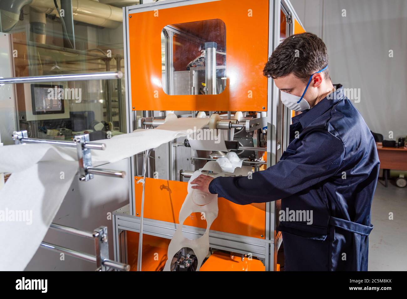 Respirator and manufacturing hi-res stock photography and images - Alamy