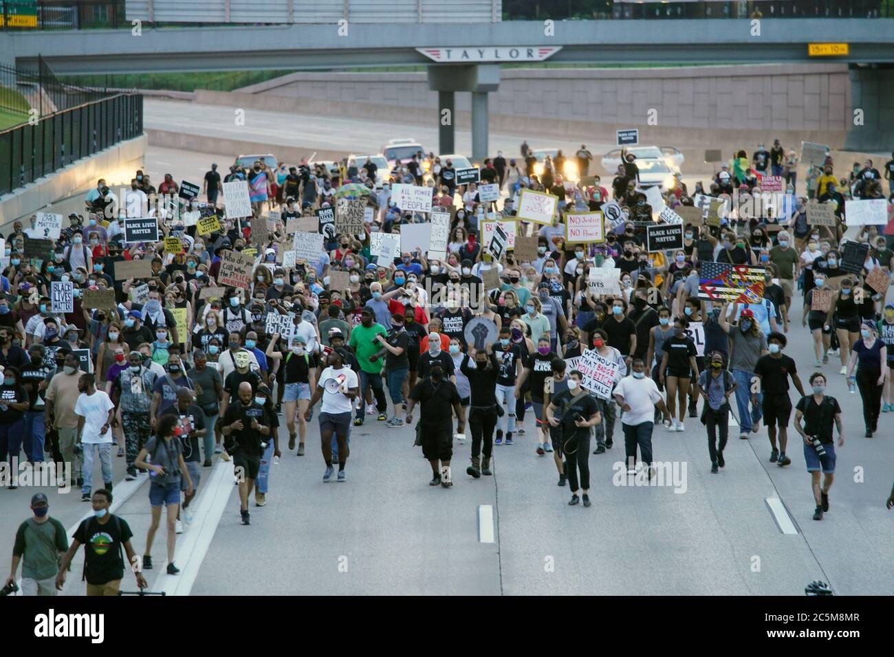 St. Louis, United States. 03rd July, 2020. Protesters walk on Highway ...