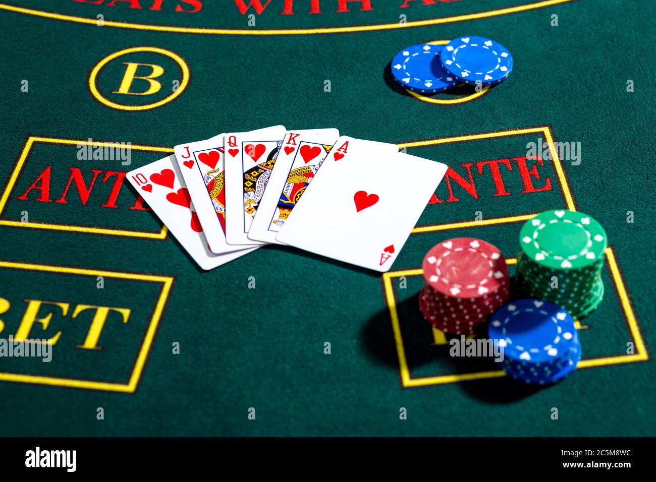 Poker play. Chips and cards Stock Photo - Alamy