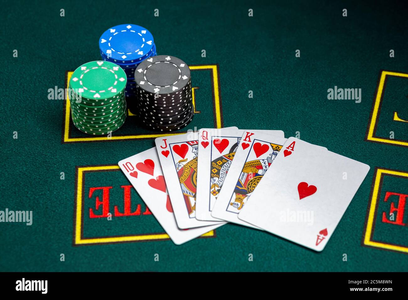 Poker play. Chips and cards Stock Photo - Alamy