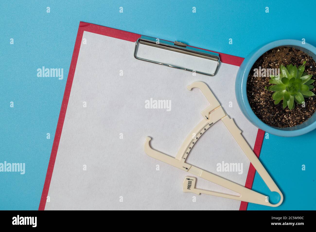 Close up of a tame measurement and body fat caliper Stock Photo - Alamy