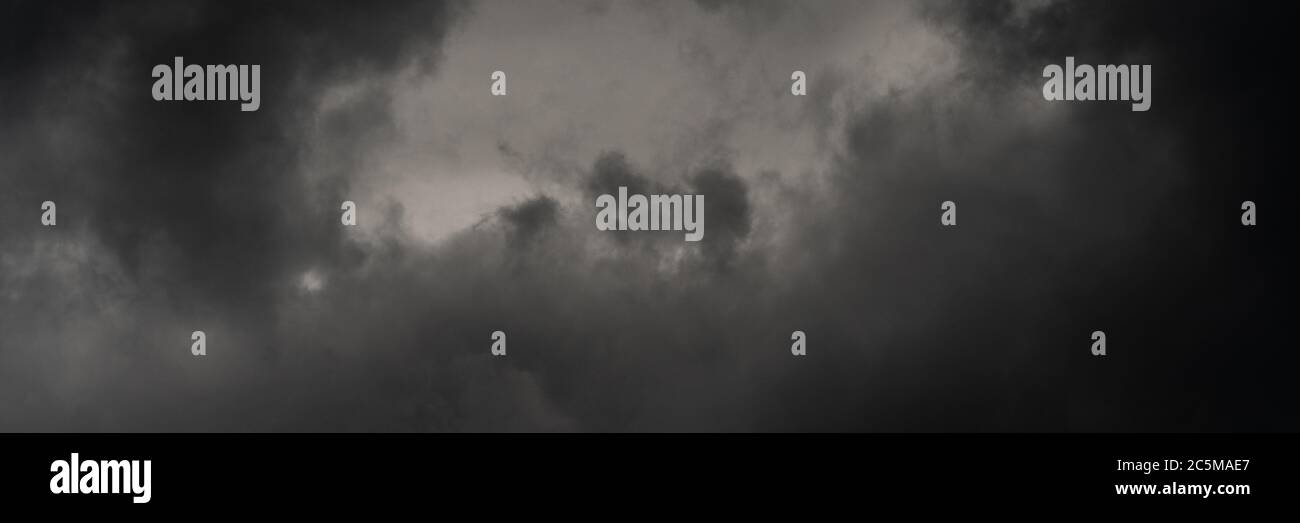 Panorama dramatic storm clouds in dusk sky, rainy and overcast weather ...