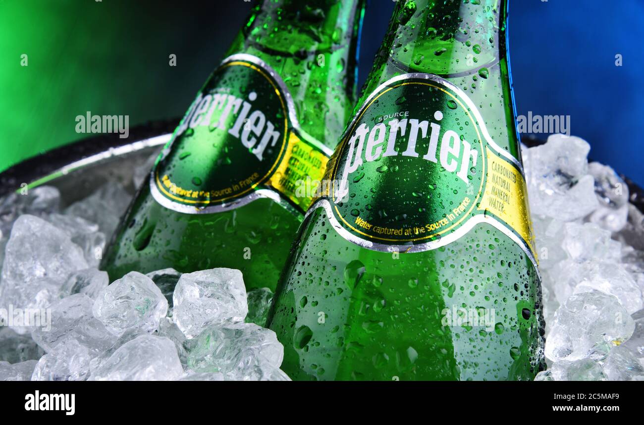 POZNAN, POL - JAN 3, 2020: Bottles of Perrier, a French brand of ...