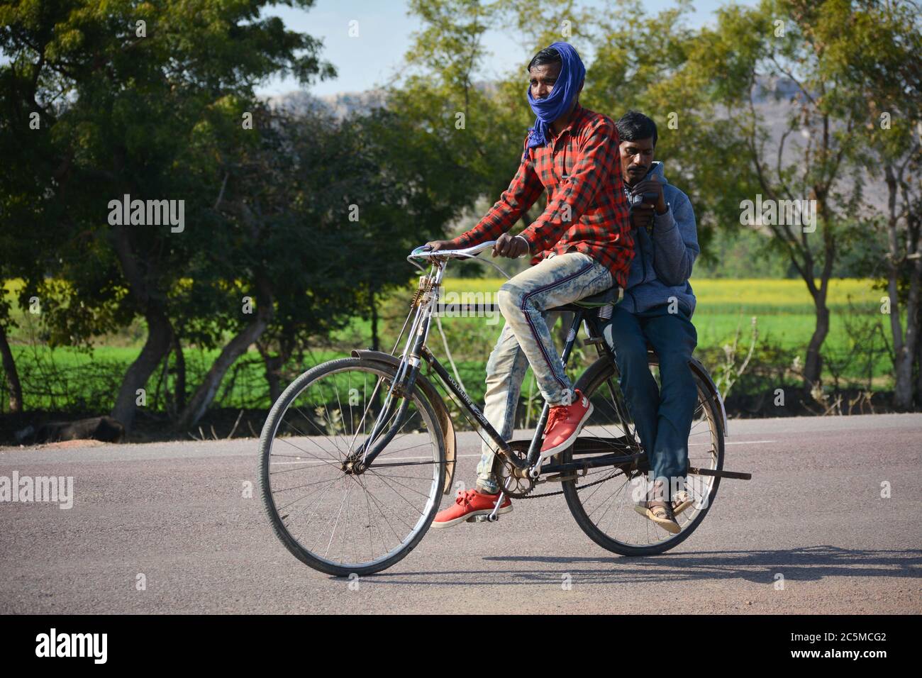 Male on cycle hi-res stock photography and images - Alamy