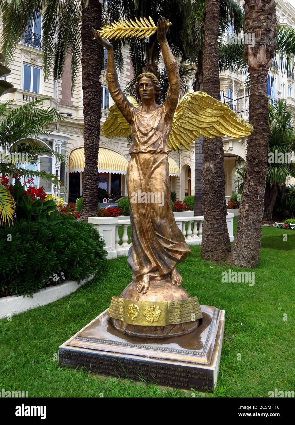 Cannes, France - July 3, 2018: Bronze statue of an angel with a palm ...