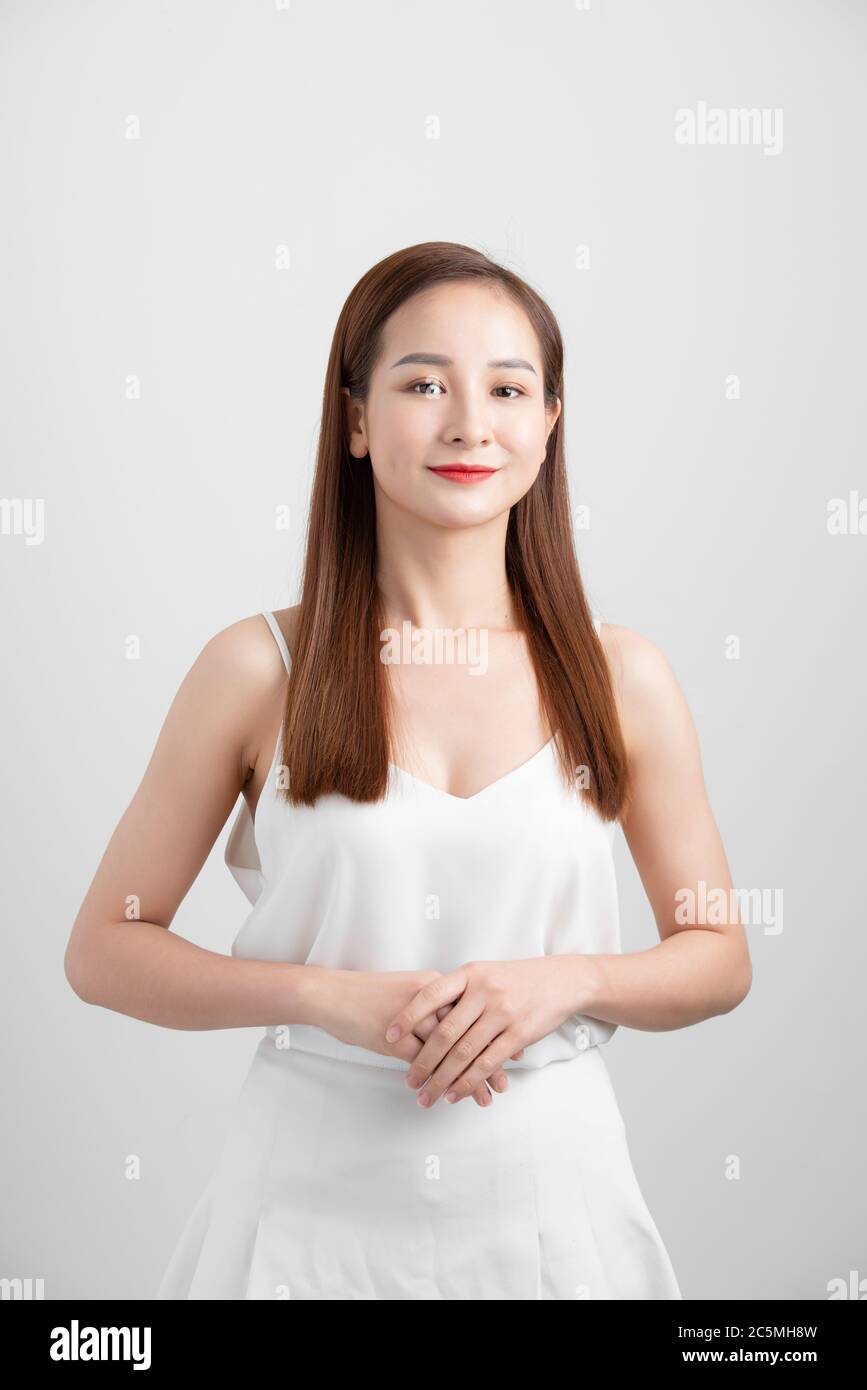 Attractive Asian woman thinking isolated on white background Stock ...