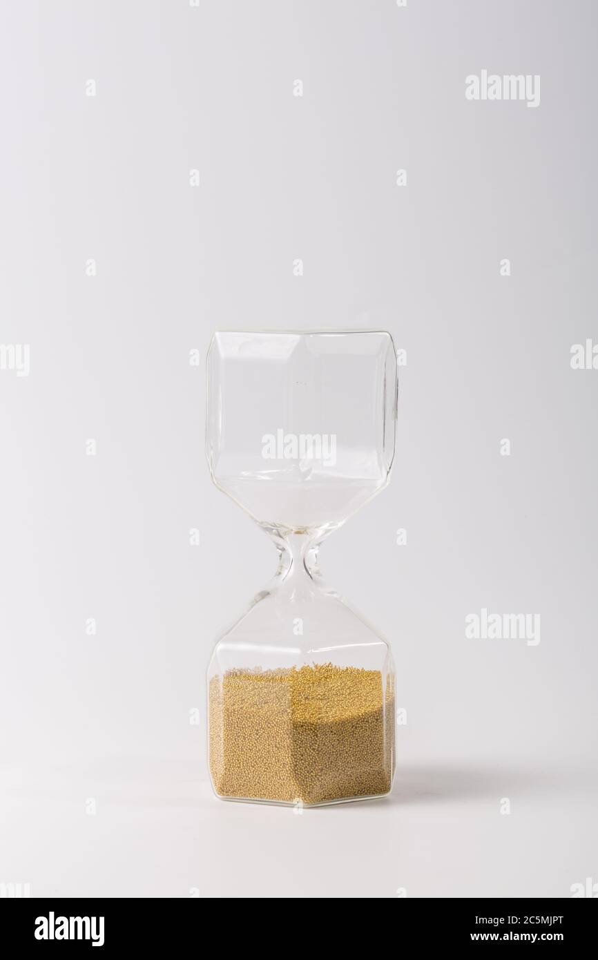 Hourglass with transparent glass on white background Stock Photo - Alamy
