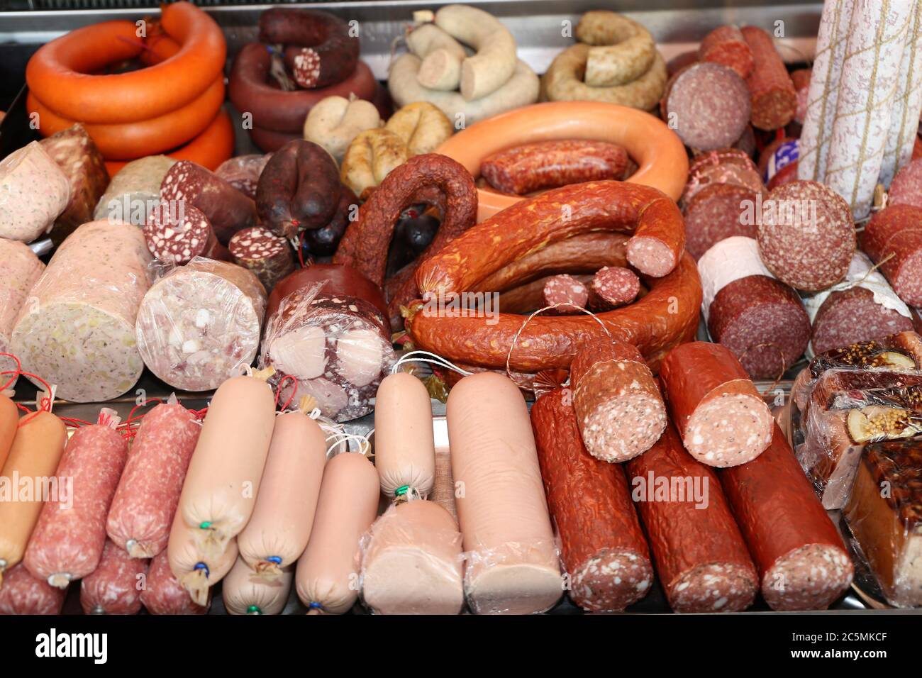 Sausage counter in a butcher's shop Stock Photo - Alamy