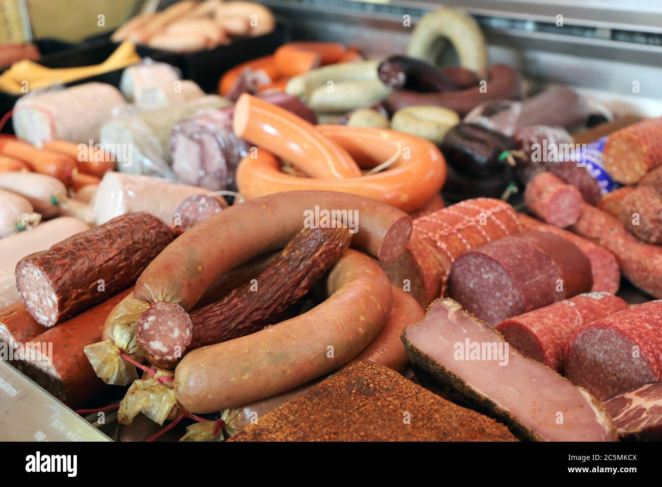 Sausage counter in a butcher's shop Stock Photo - Alamy