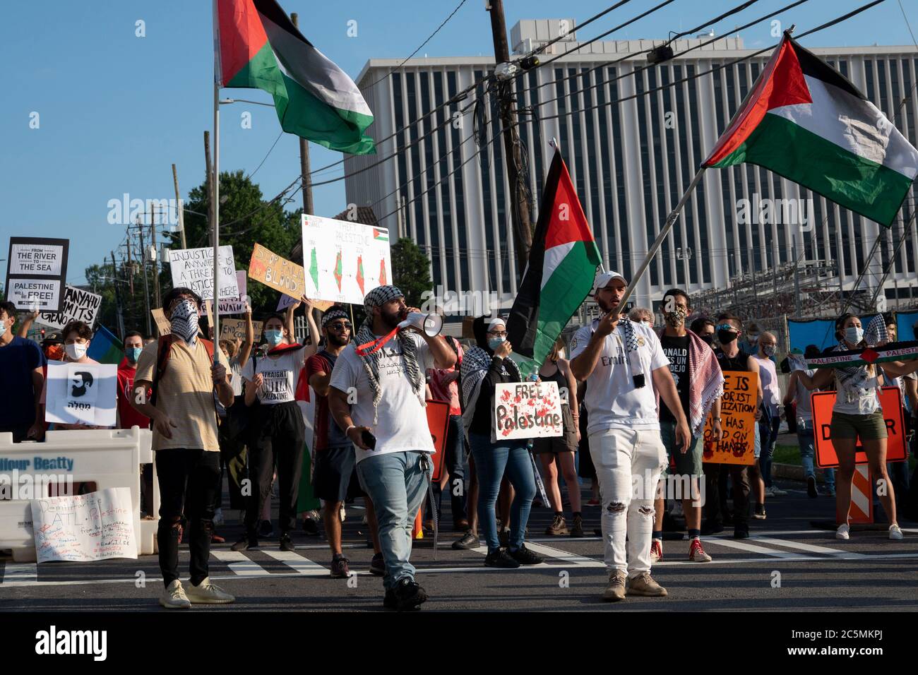 Atlanta, USA. 3rd Jul, 2020. Protesters march down Spring Street in ...