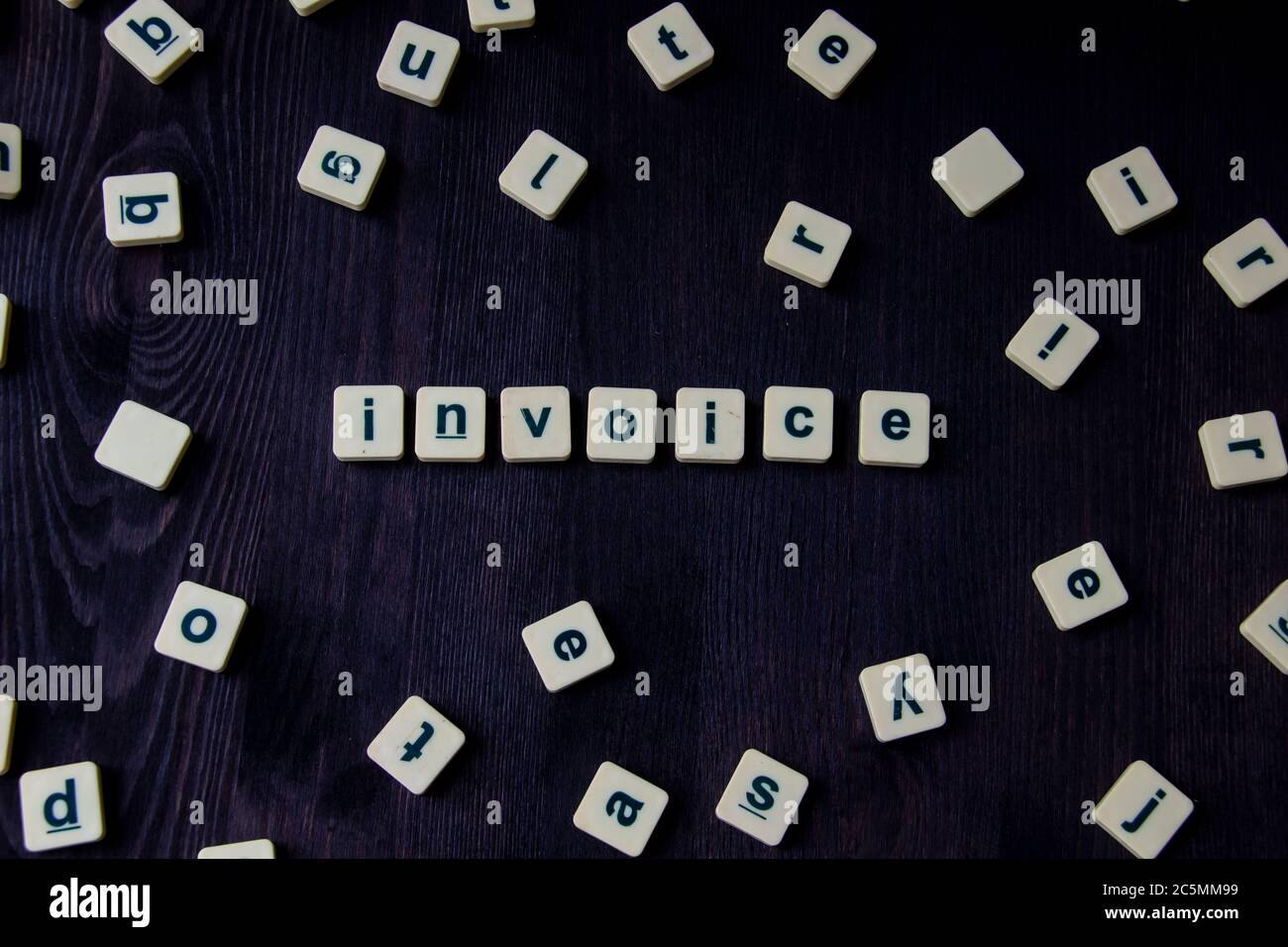 Word or phrase INVOICE made with letters on the wood, great image for ...