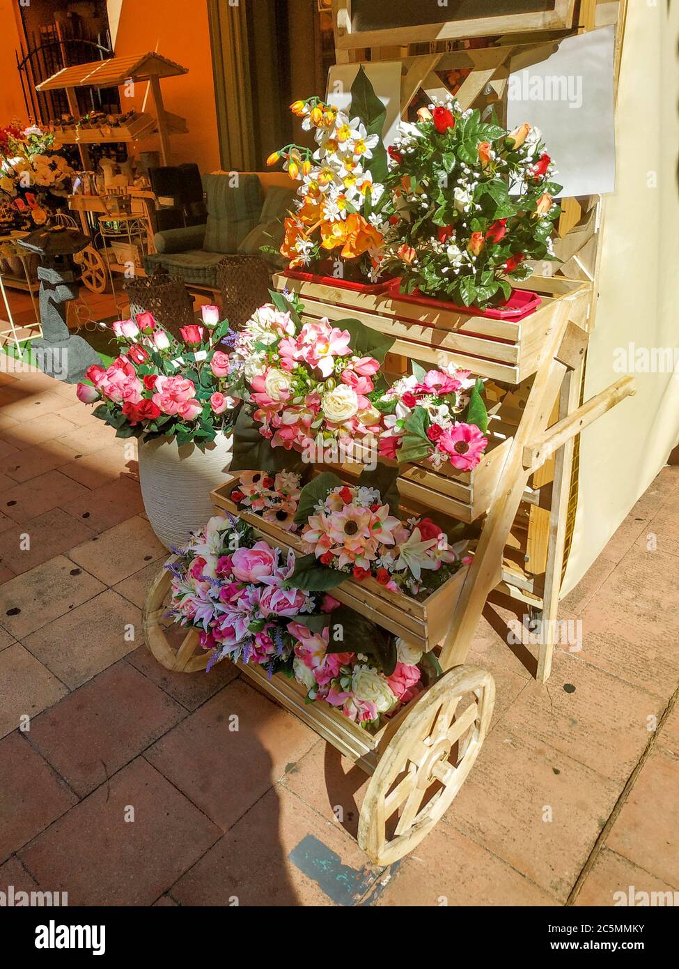 Outdoor wooden tray with flowers Stock Photo - Alamy