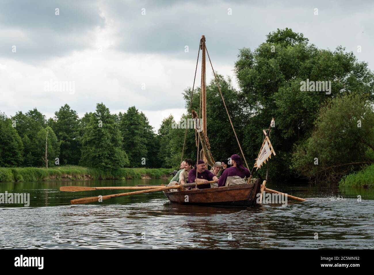 A group of men in casual clothes from the Viking era (9-11th century ...