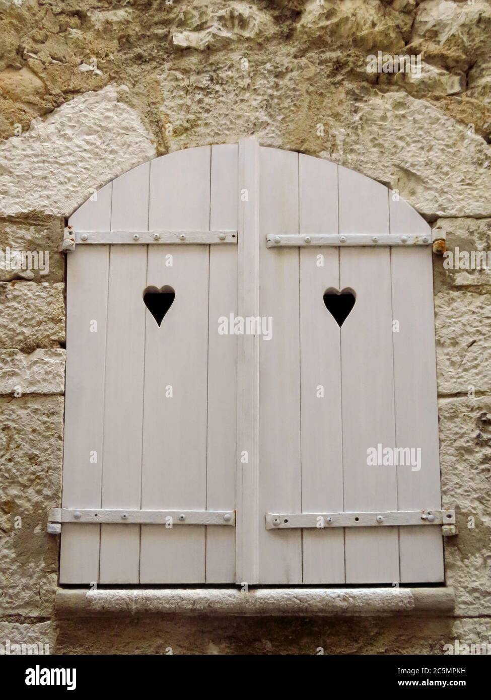 Wooden shutters on window in the medieval city of Saint-Paul de Vence ...