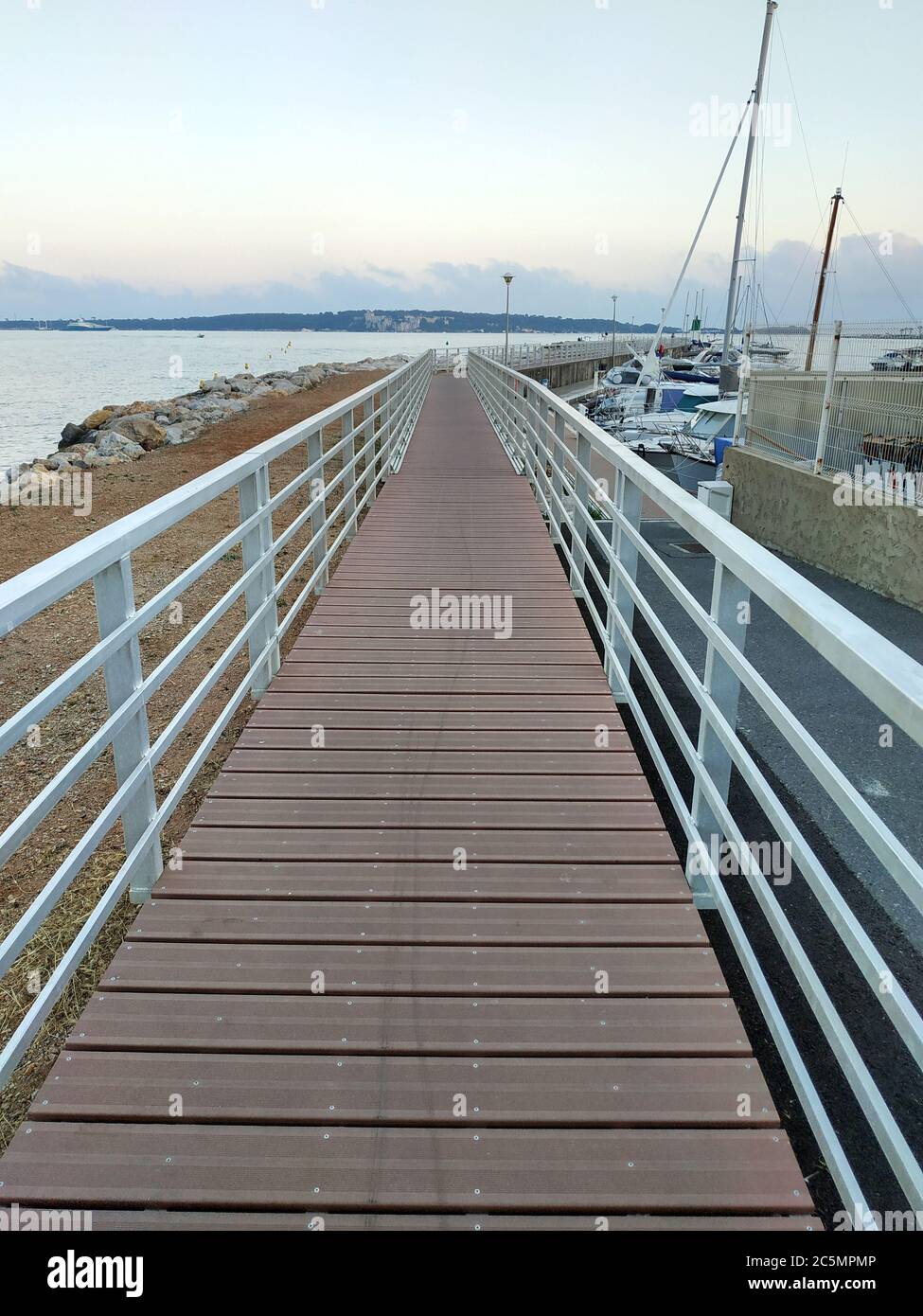 Wooden walkway pier on the sea, Cannes, France Stock Photo - Alamy