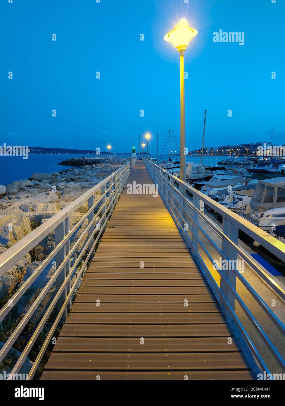 Wooden walkway pier on the sea, Cannes, France Stock Photo - Alamy