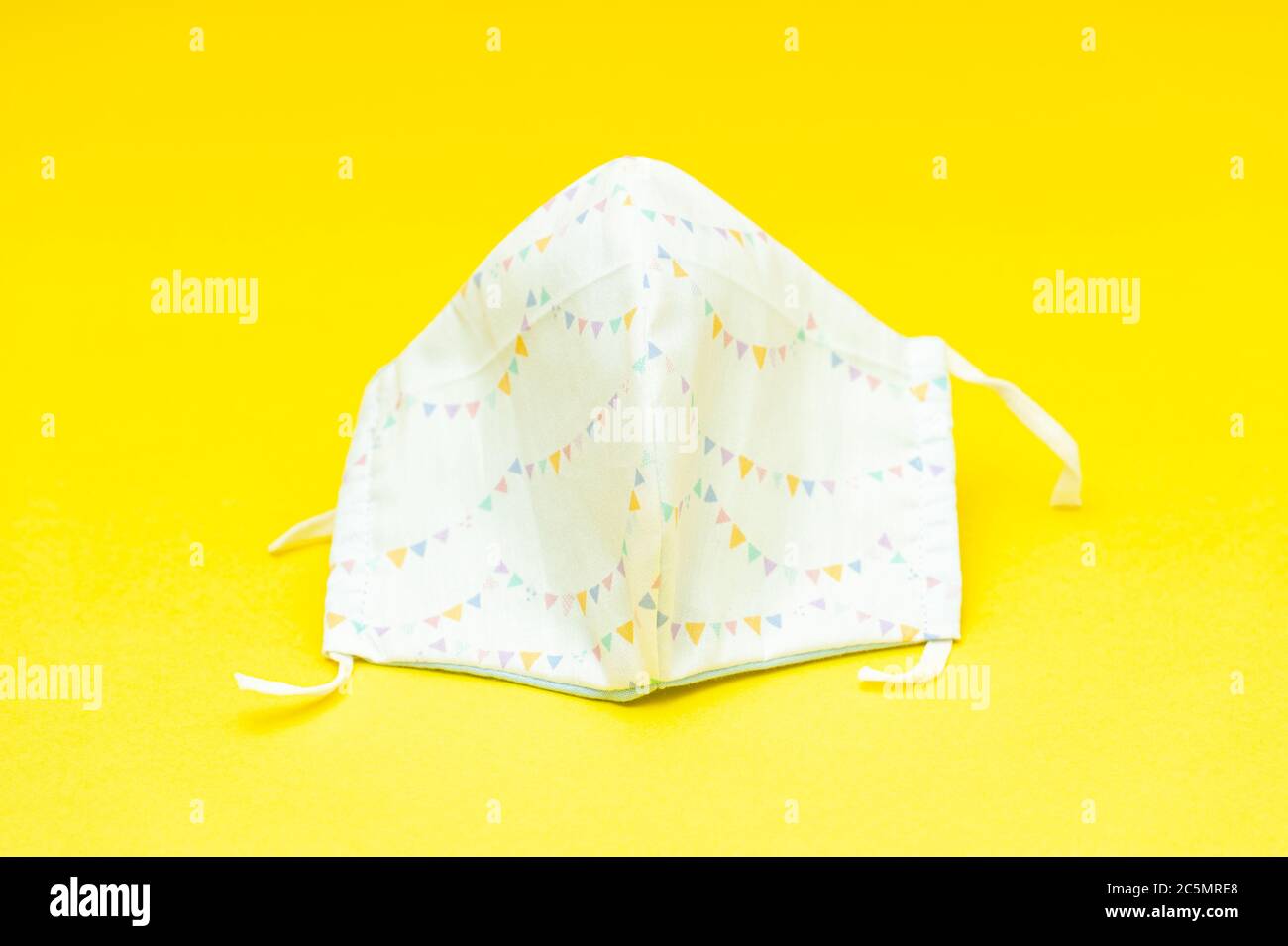 White with colorful triangular flags patterned DIY fabric face mask for ...