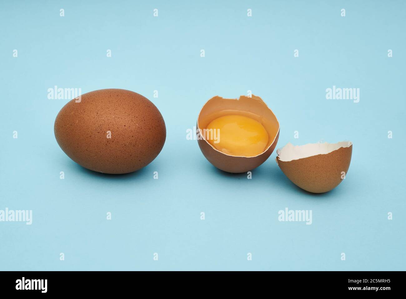 Chicken eggs whole and parts. Half an egg, egg yolk, shell Stock Photo ...