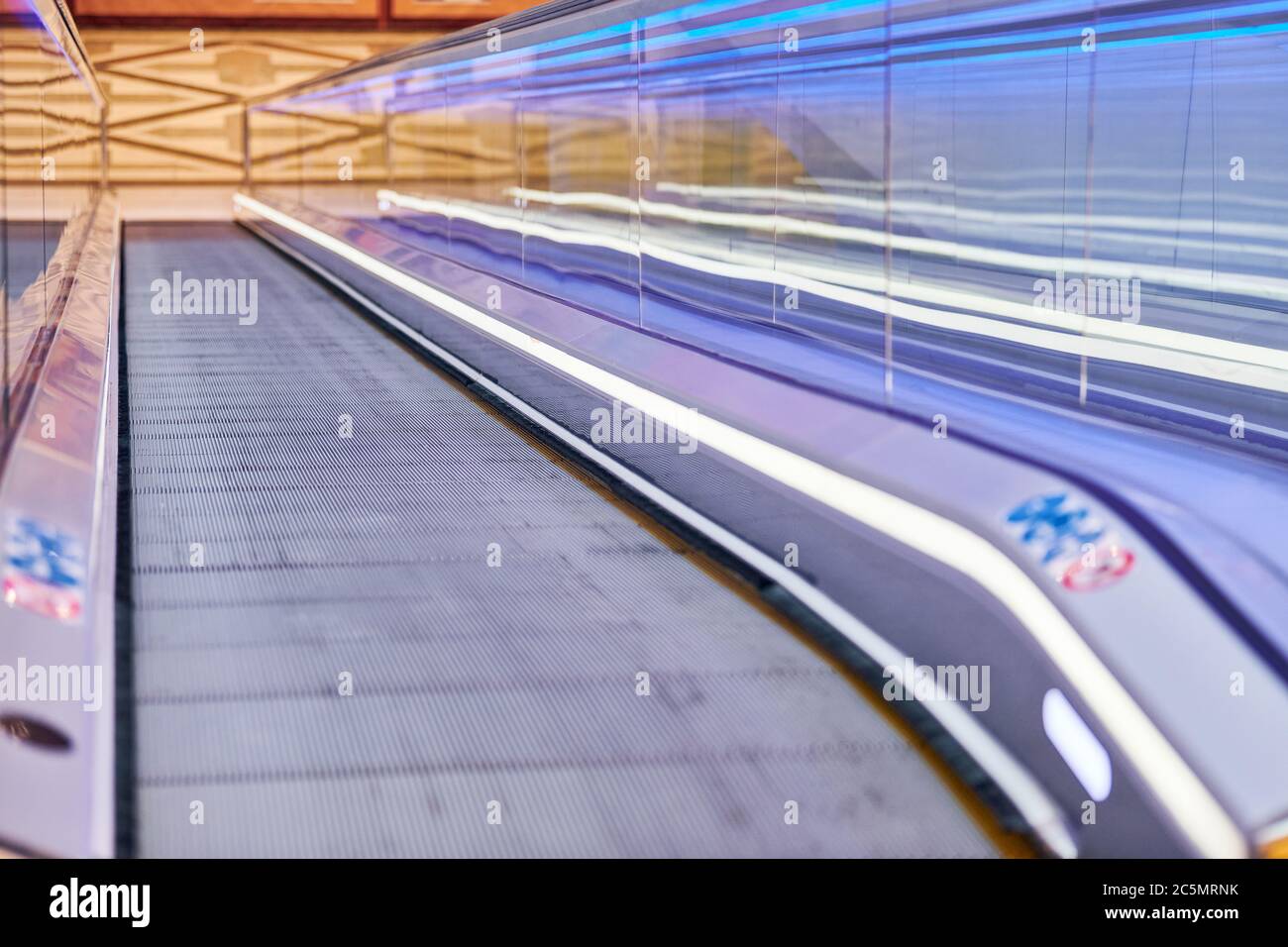 Moving walkway in shopping center. Horizontal slow-moving conveyor ...