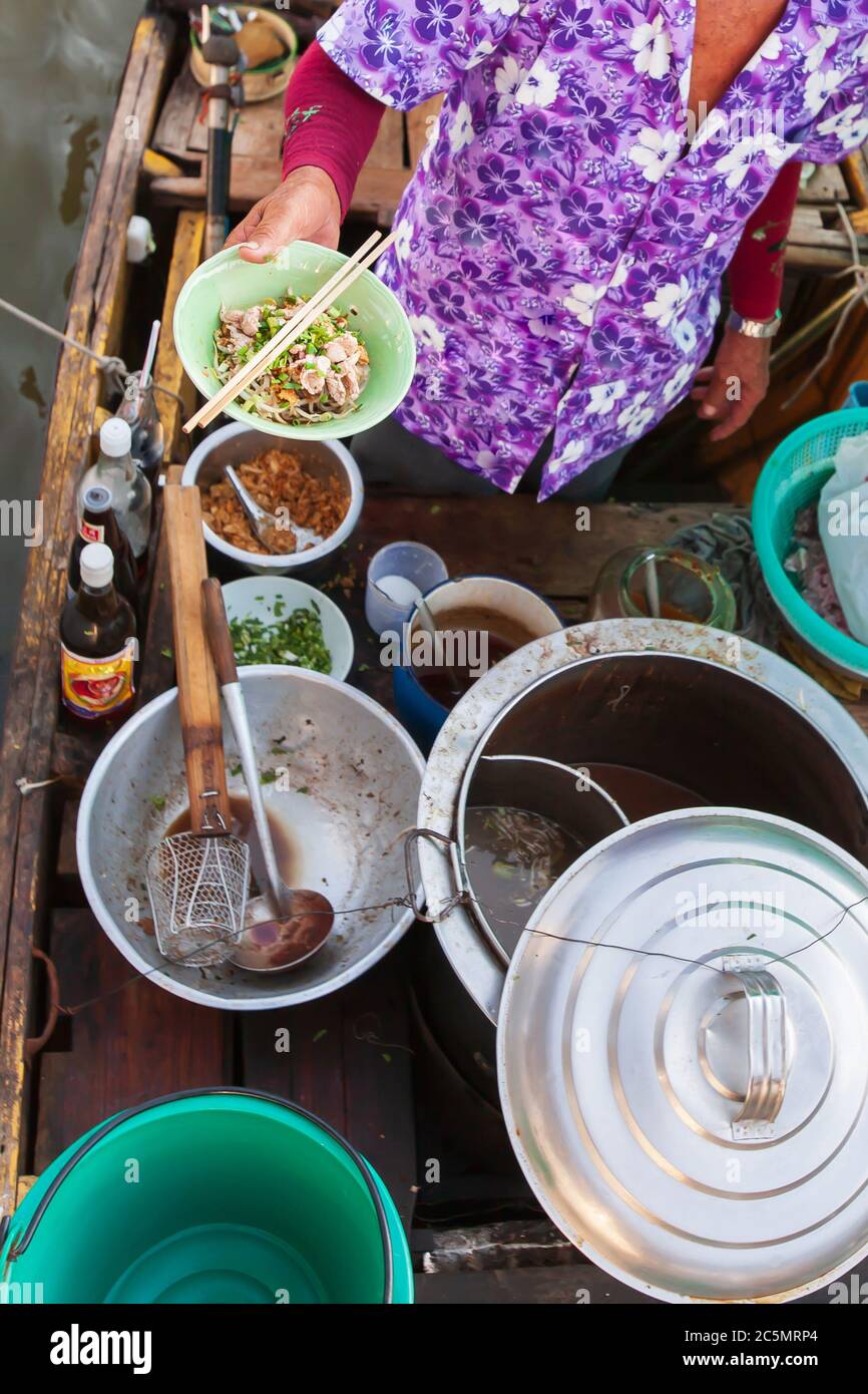 Boat noodles, Thai vendor selling rice noodles on the boat, dried rice ...