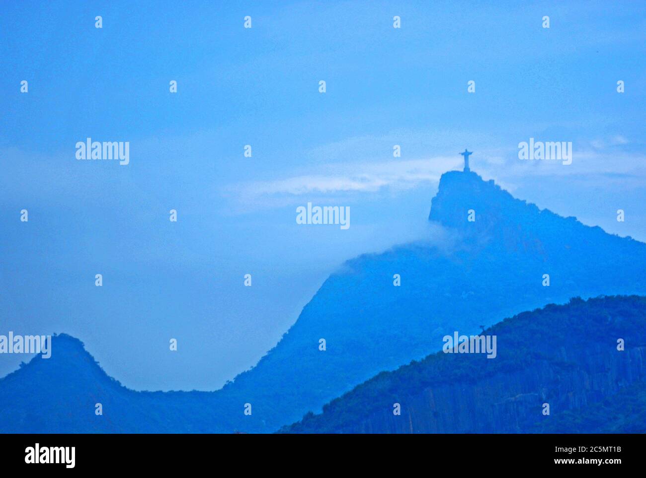 Statue of Christ the Redeemer stands on its base at the top of ...